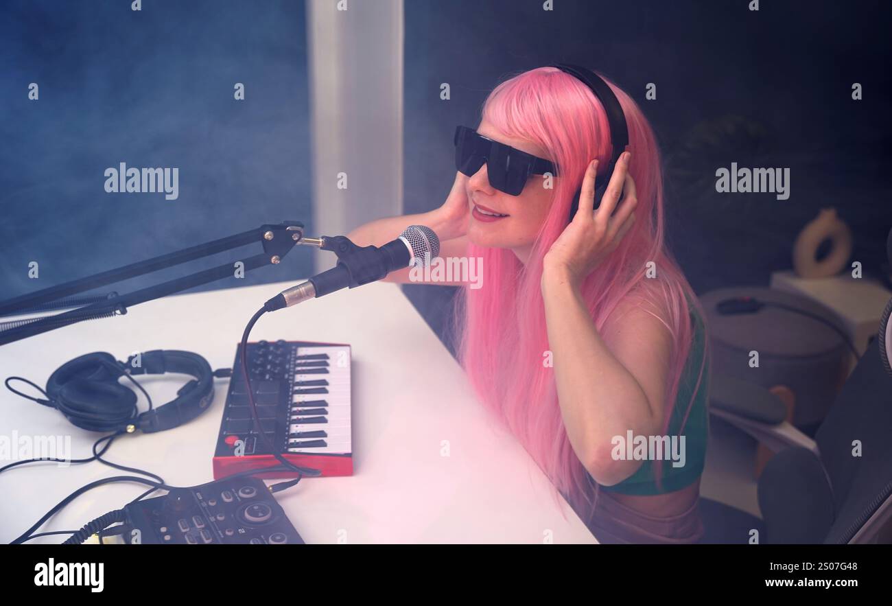 Beautiful young singer and musician broadcast from her home studio ...