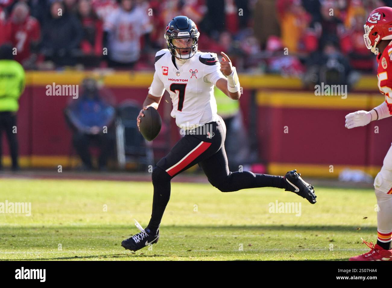 Houston Texans quarterback C.J. Stroud runs the ball during the first ...