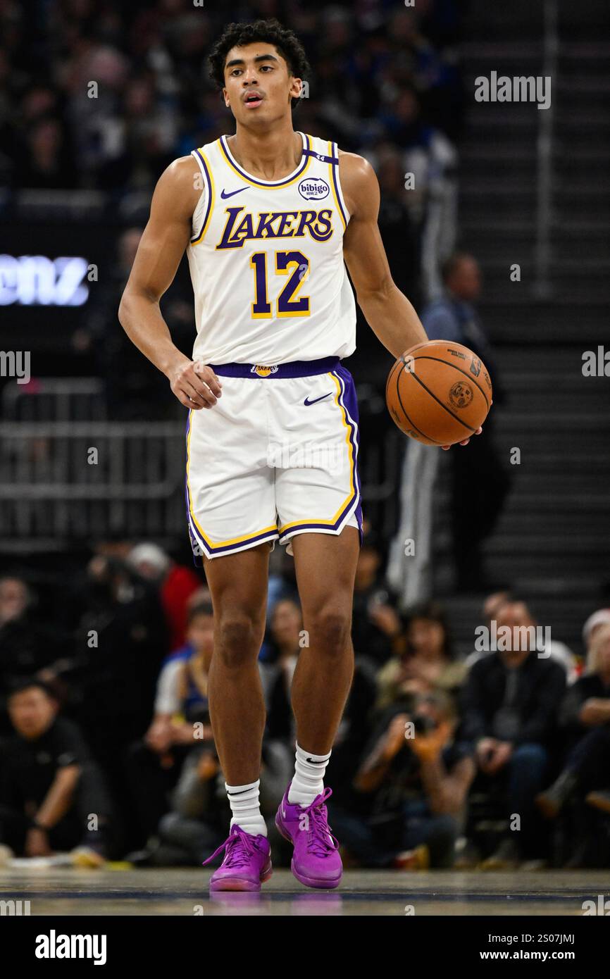Los Angeles Lakers guard Max Christie (12) dribbles against the Golden ...