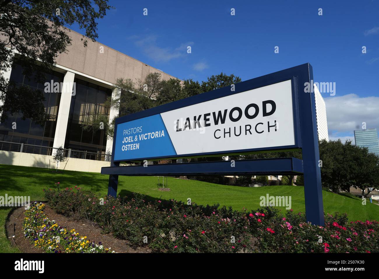 A sign at the Lakewood Church with the names of pastors Joel Osteen and ...
