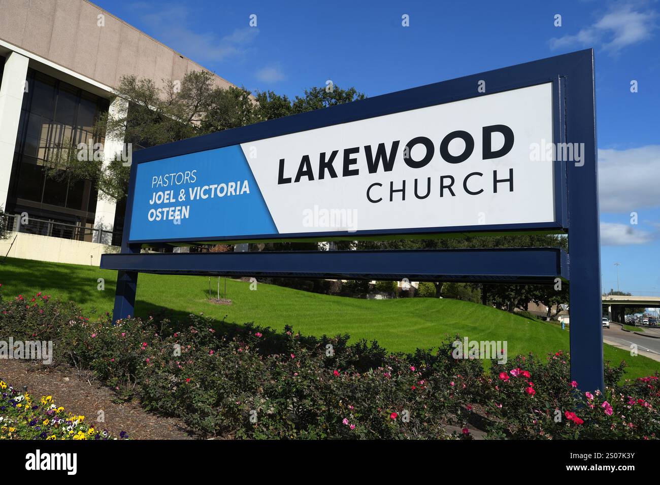 A sign at the Lakewood Church with the names of pastors Joel Osteen and ...