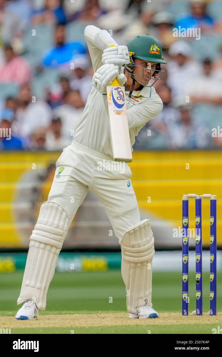Australia's Alex Carey bats during play on the first day of the fourth ...