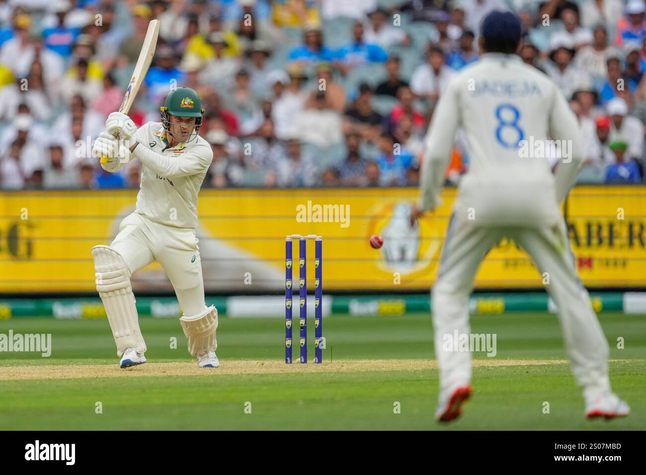 Australia's Alex Carey watches the ball after playing a shot during ...