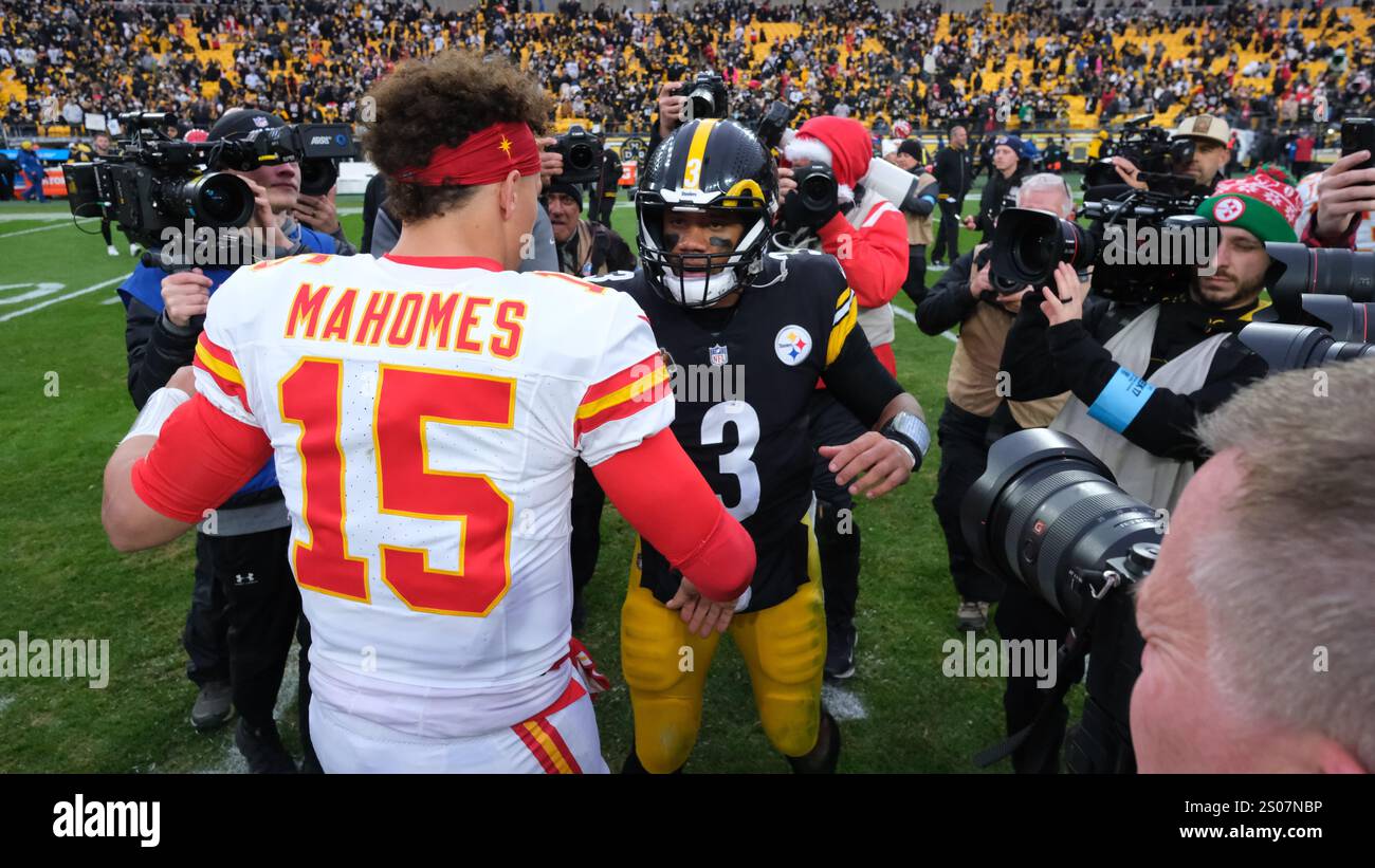 December 25, 2024: Russell Wilson #3, and Patrick Mahomes #15 during ...