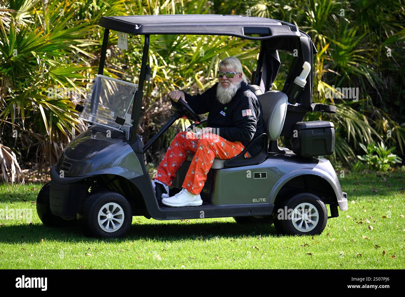 John Daly drives to the fourth hole during the first round of the PNC ...