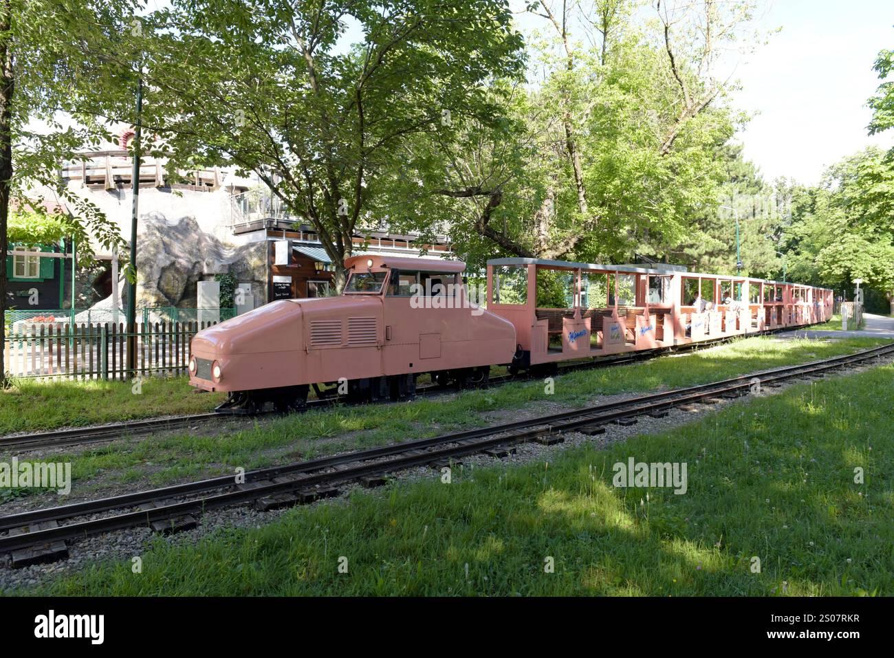 Tourists on a narrow gauge train on the Prater Liliputbahn, Prater Park ...