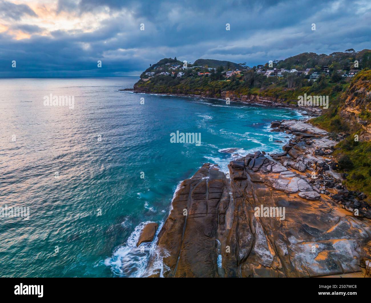 Aerial sunrise over Whale Beach in the Northern Beaches region of ...