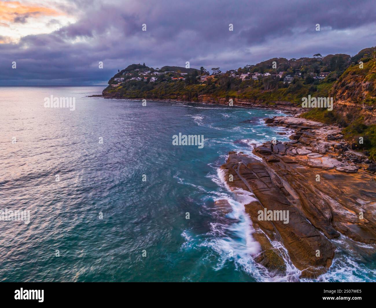 Aerial sunrise over Whale Beach in the Northern Beaches region of ...