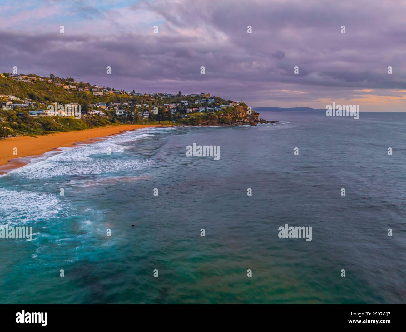 Aerial sunrise over Whale Beach in the Northern Beaches region of ...