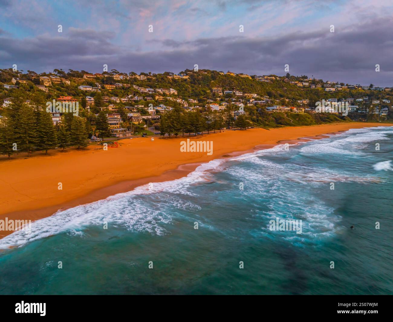 Aerial sunrise over Whale Beach in the Northern Beaches region of ...