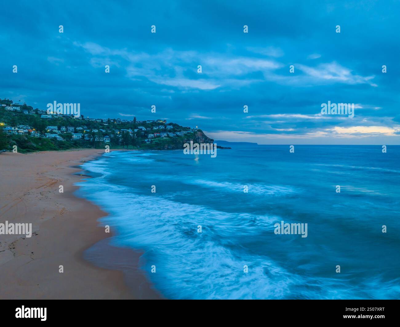 Aerial sunrise over Whale Beach in the Northern Beaches region of ...