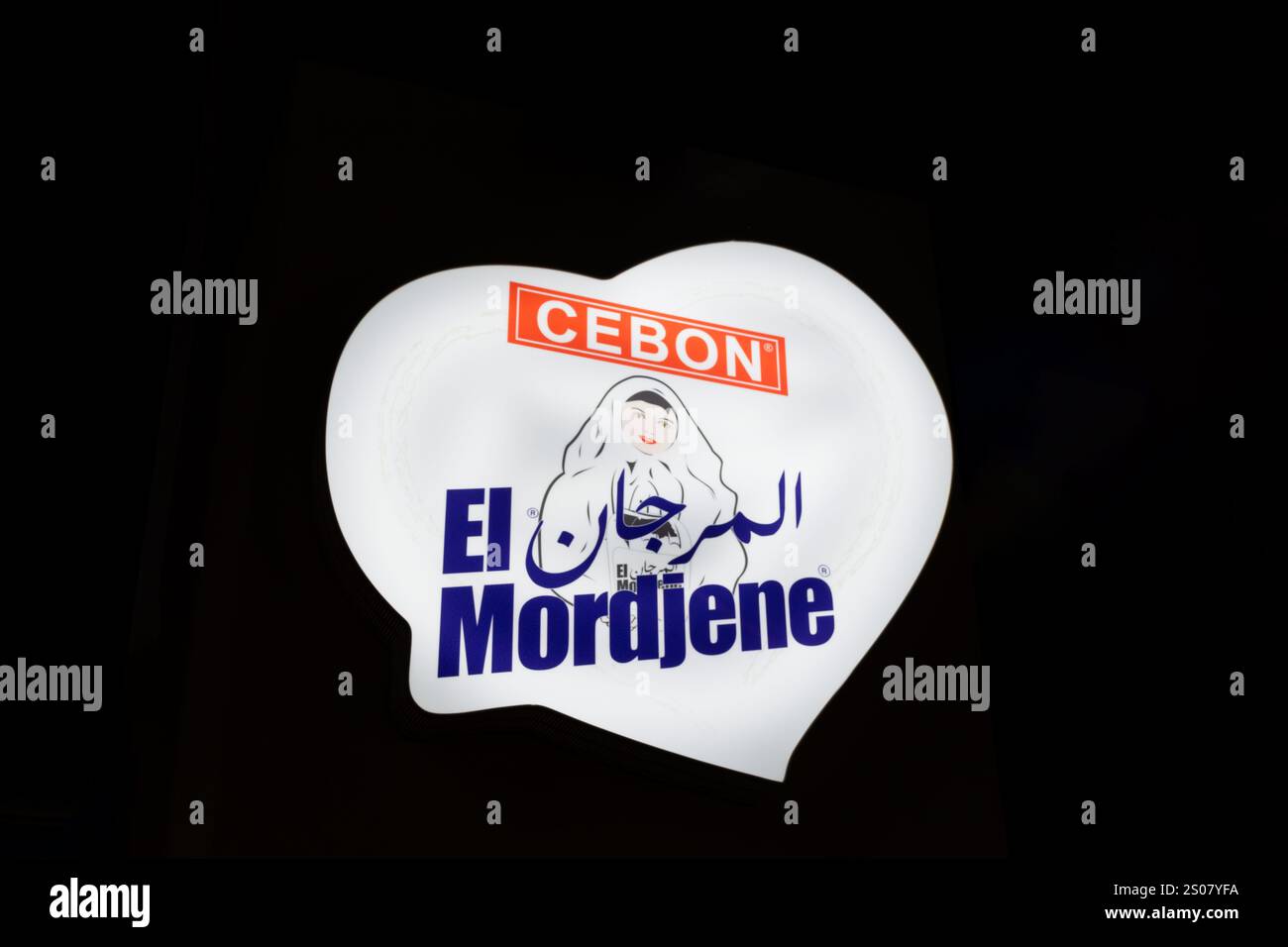 El Mordjene sign at night. Famous Algerian Company Stock Photo - Alamy