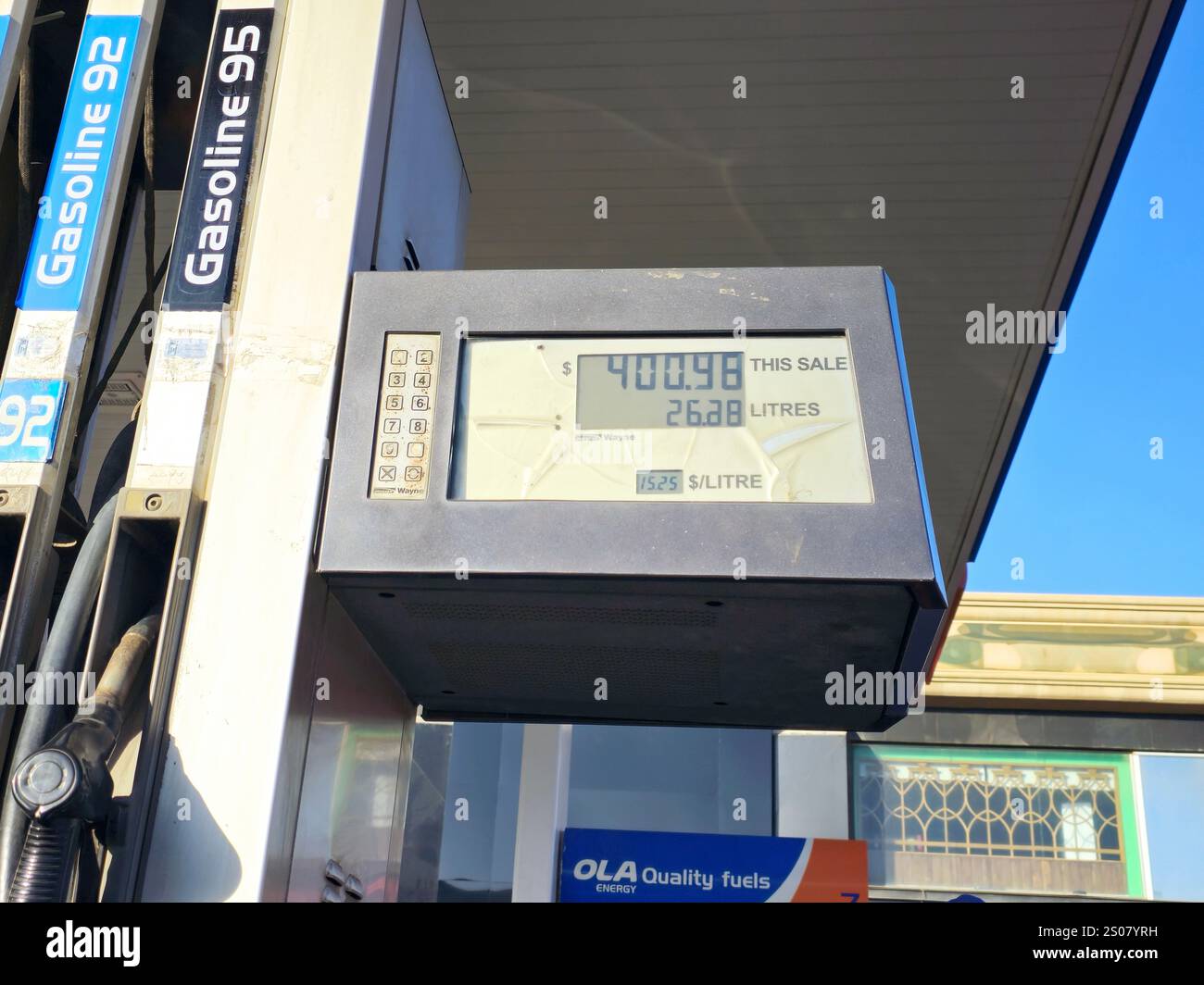 Cairo, Egypt, December 3 2024: OLA gas service station with filling gun ...
