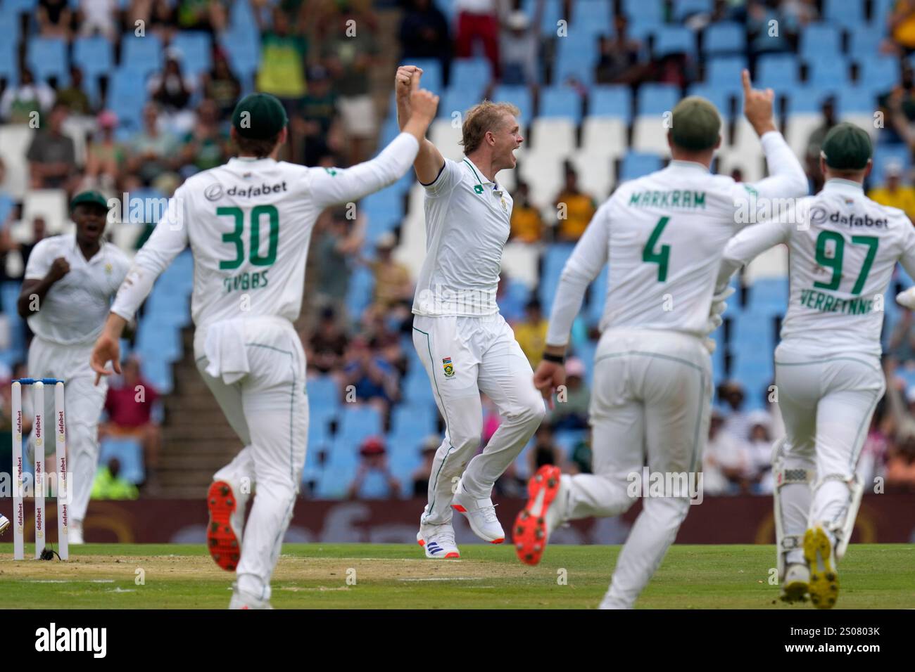 South Africa's Corbin Bosch, centre, celebrates with teammates after ...