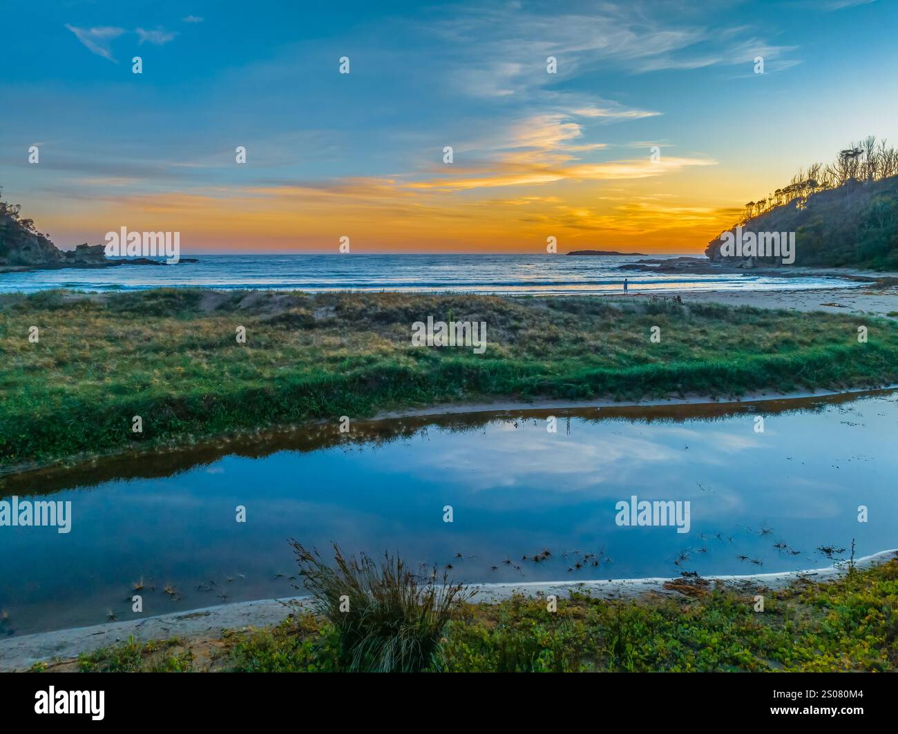 Early morning aerial views over the sea and lagoon at Lilli Pilli Beach ...