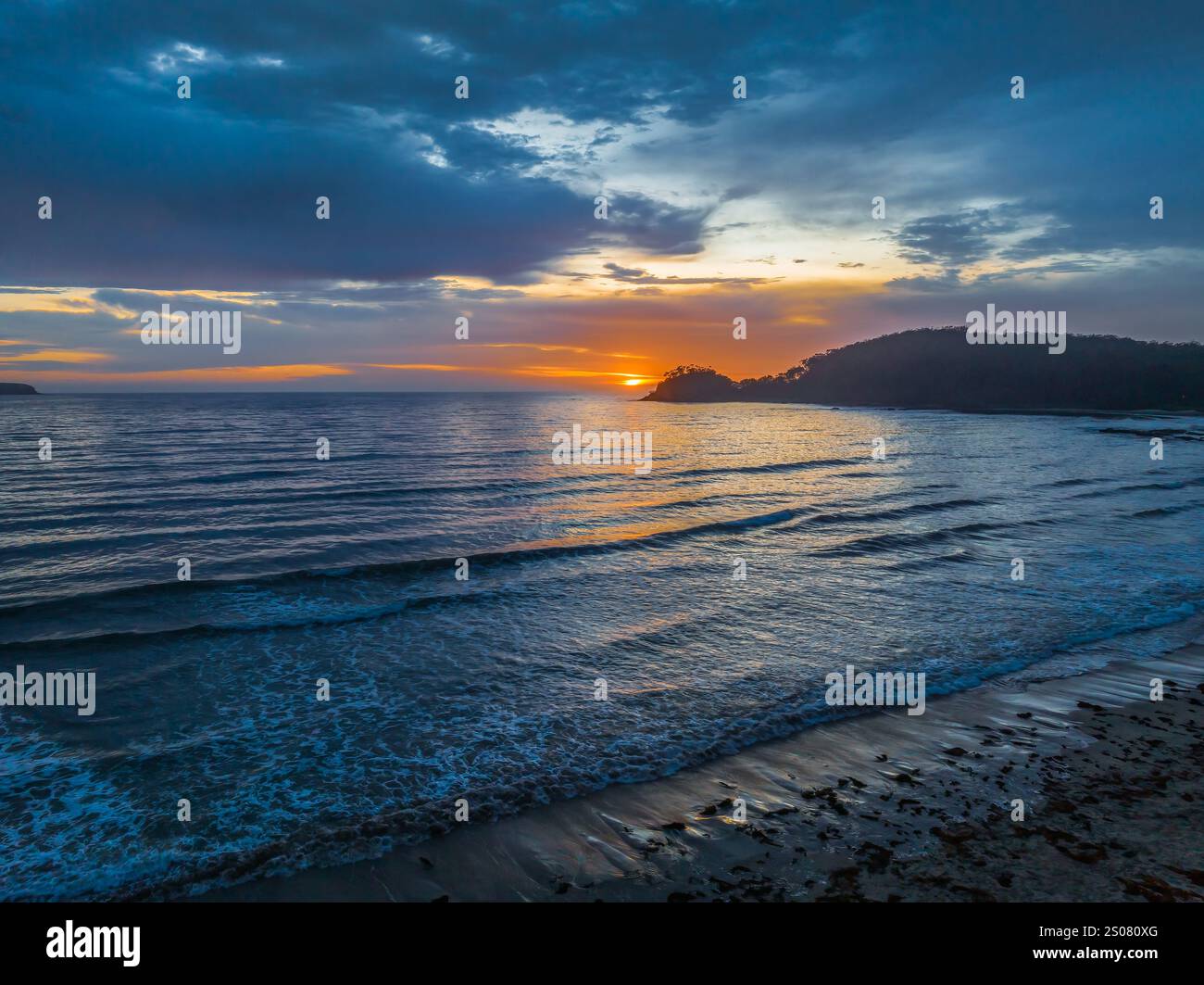 Early morning aerial views over the beach and sea with clouds at Surf ...
