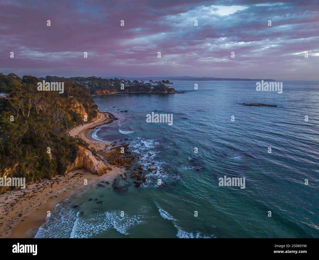Early morning aerial views over the beach and sea with clouds at Surf ...