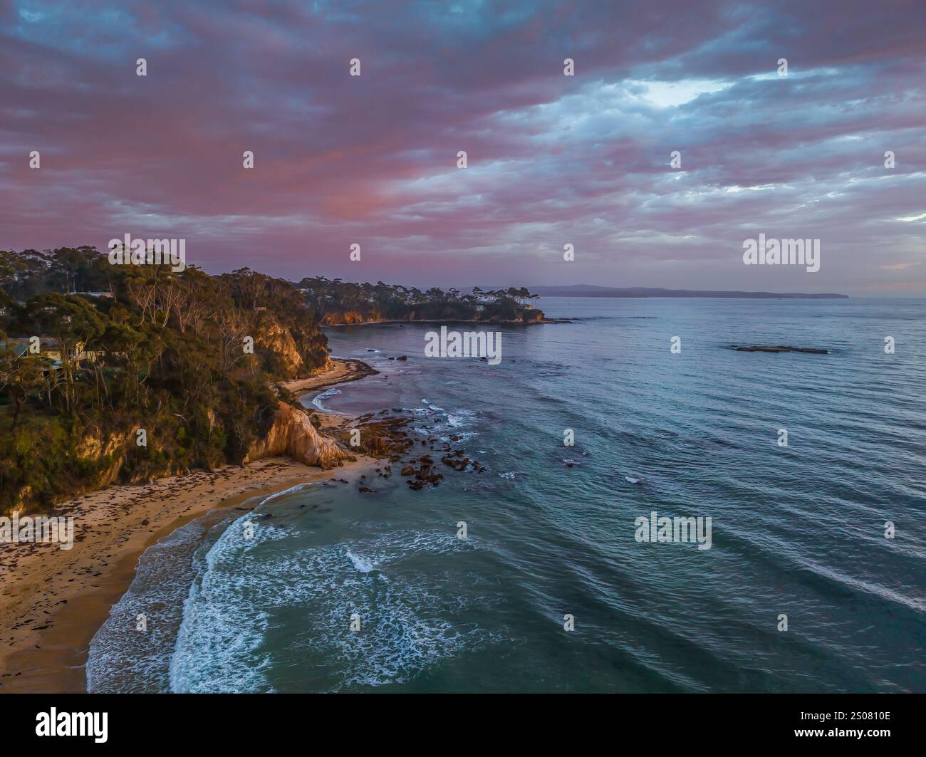 Early morning aerial views over the beach and sea with clouds at Surf ...