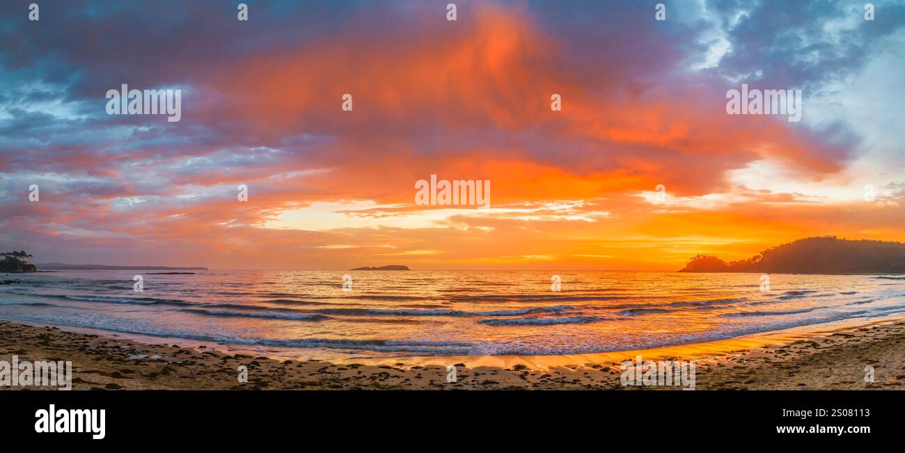 Early morning panorama aerial views over the beach and sea with clouds ...