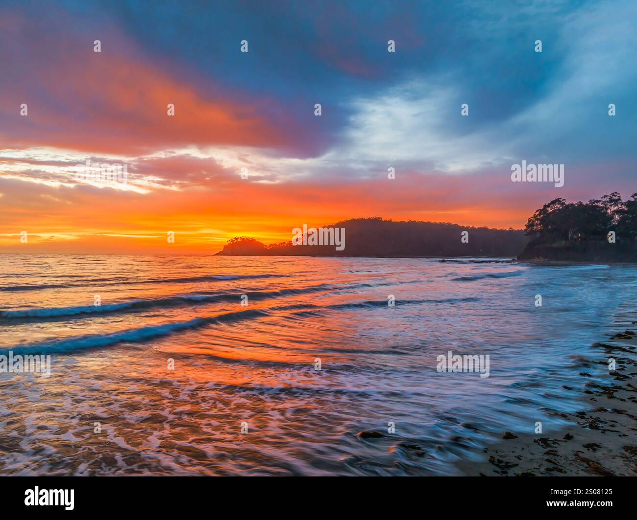 Early morning aerial views over the beach and sea with clouds at Surf ...