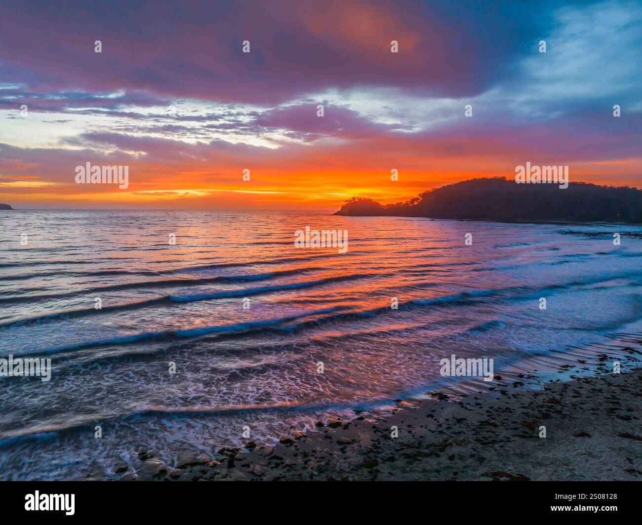 Early morning aerial views over the beach and sea with clouds at Surf ...