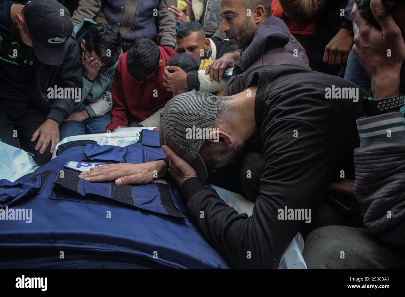 Relatives of 5 photojournalists Ayman al-Jedy and journalists Faisal ...