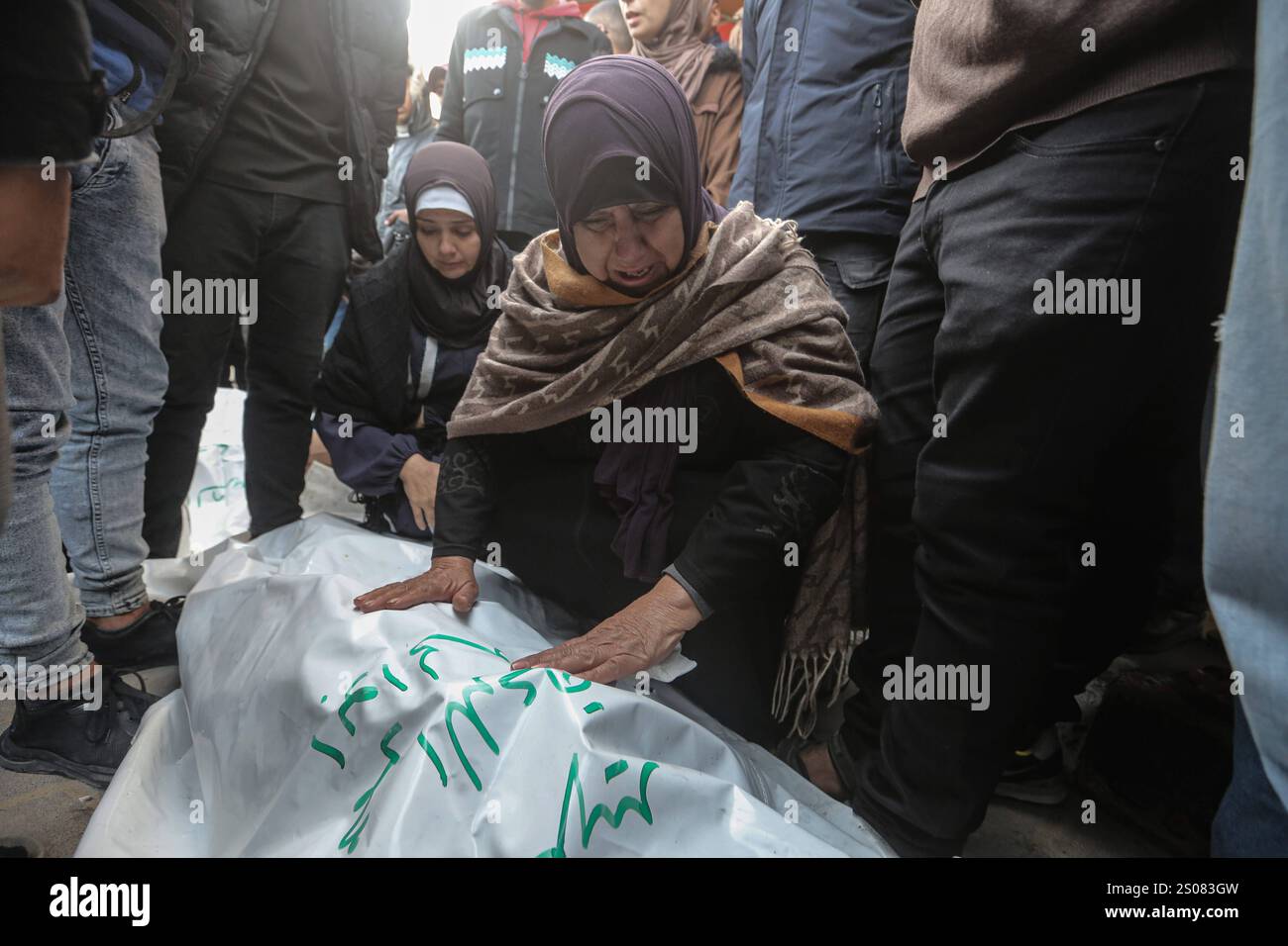 Relatives of 5 photojournalists Ayman al-Jedy and journalists Faisal ...