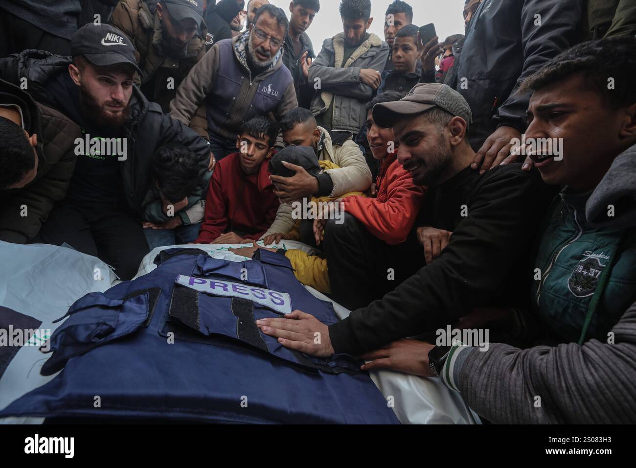 Relatives of 5 photojournalists Ayman al-Jedy and journalists Faisal ...
