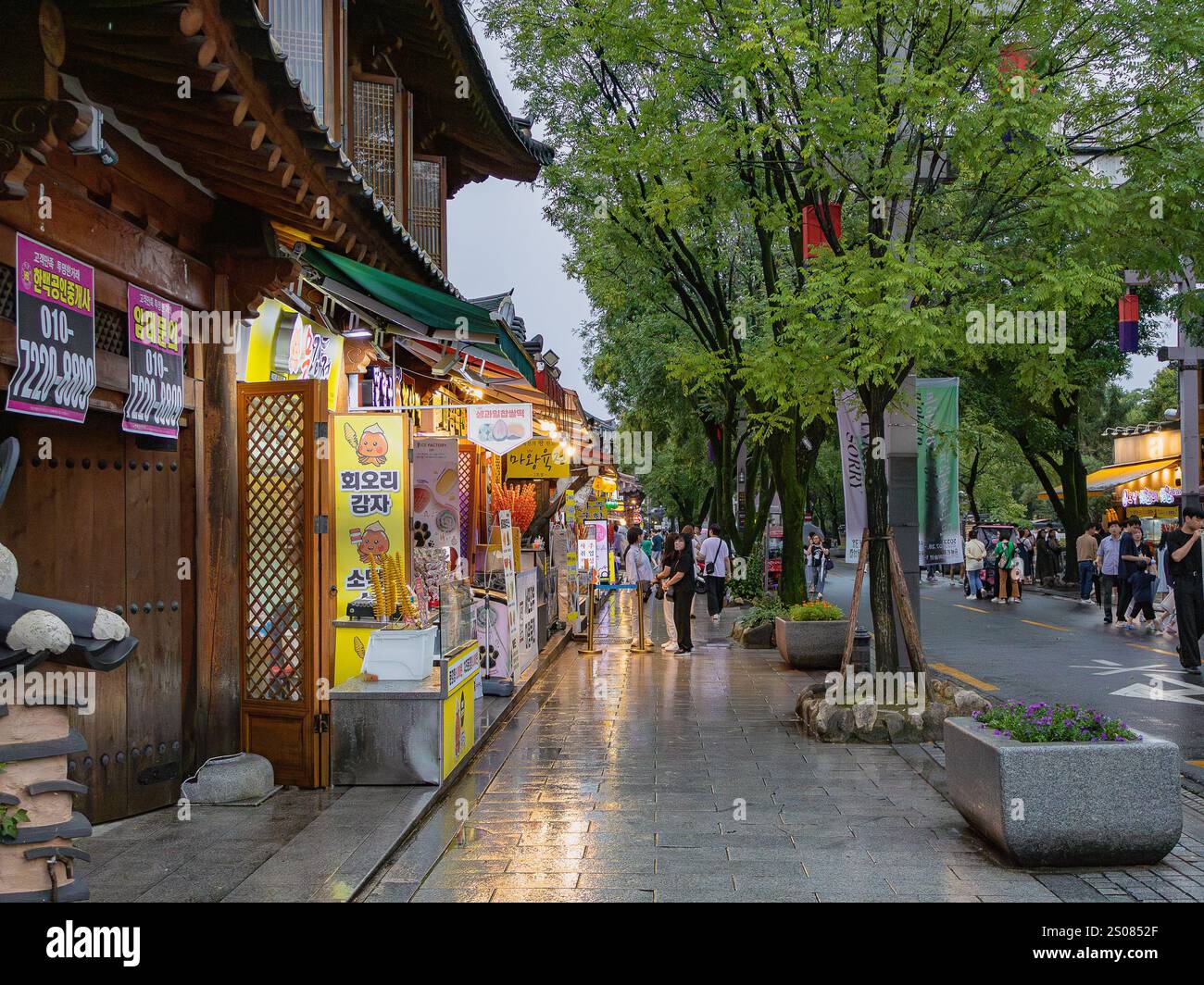 Jeonju hanok village pedestrian walking street lined with shops and ...