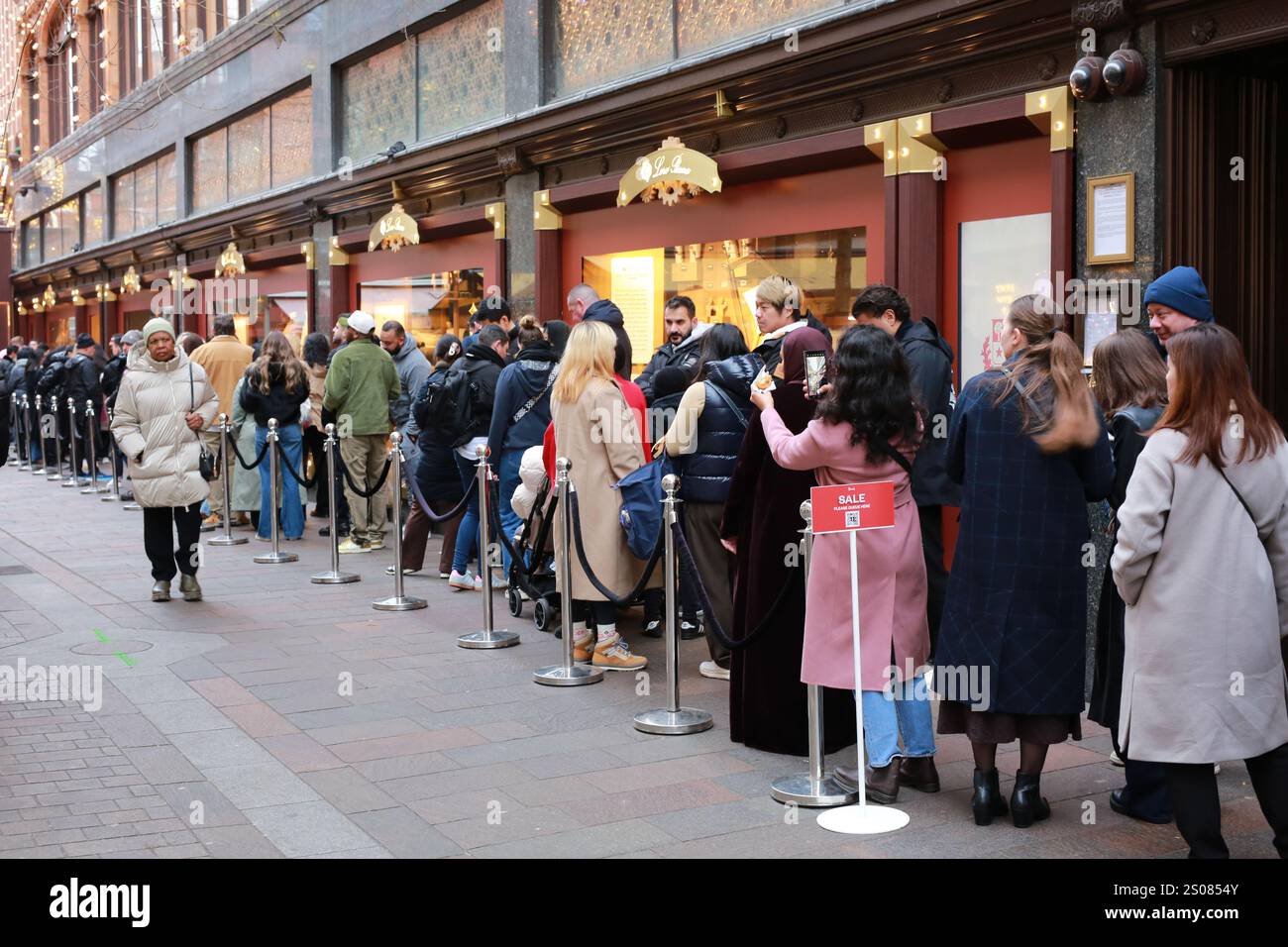 London, UK. 26 December 2024. Long queue outside Harrods store in ...