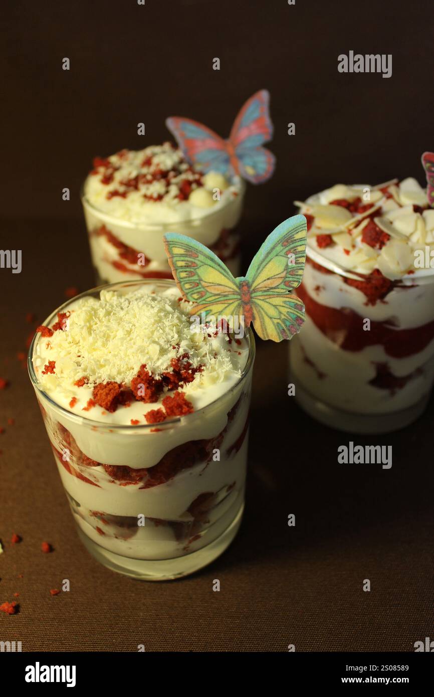 Delicious red velvet parfaits decorated with butterfly toppings and ...