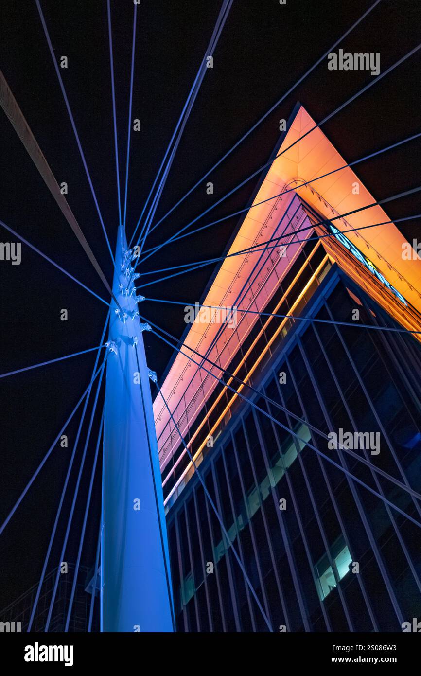 Night abstract angle of the buildings and Millennium Bridge in Denver ...