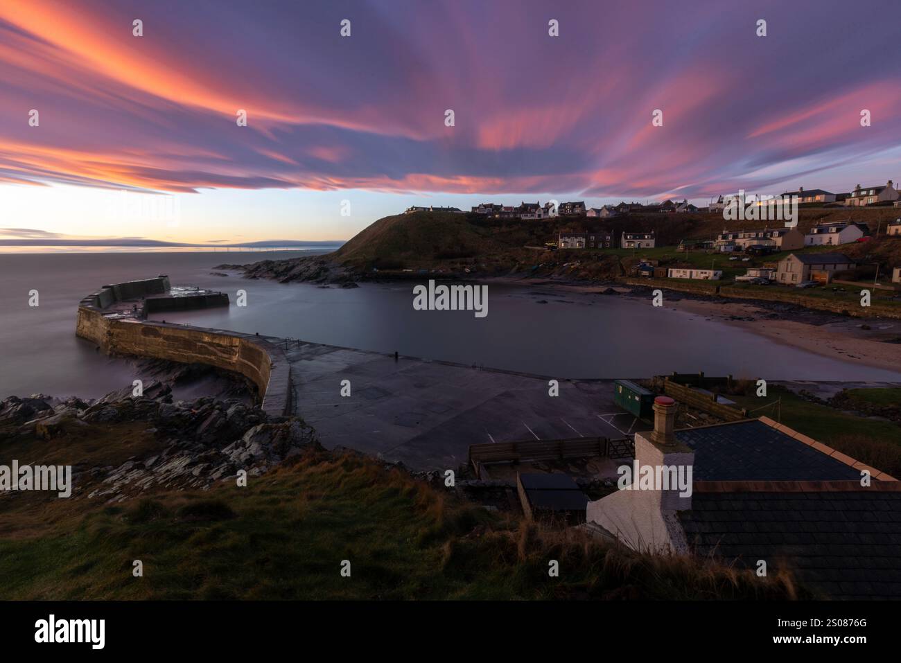 The rugged coastline at the small fishing village Collieston in ...