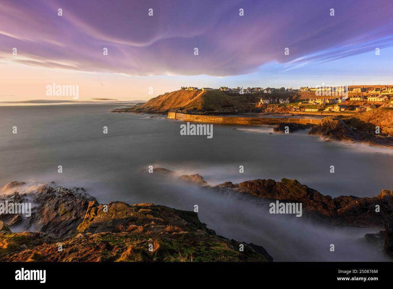 The rugged coastline at the small fishing village Collieston in ...