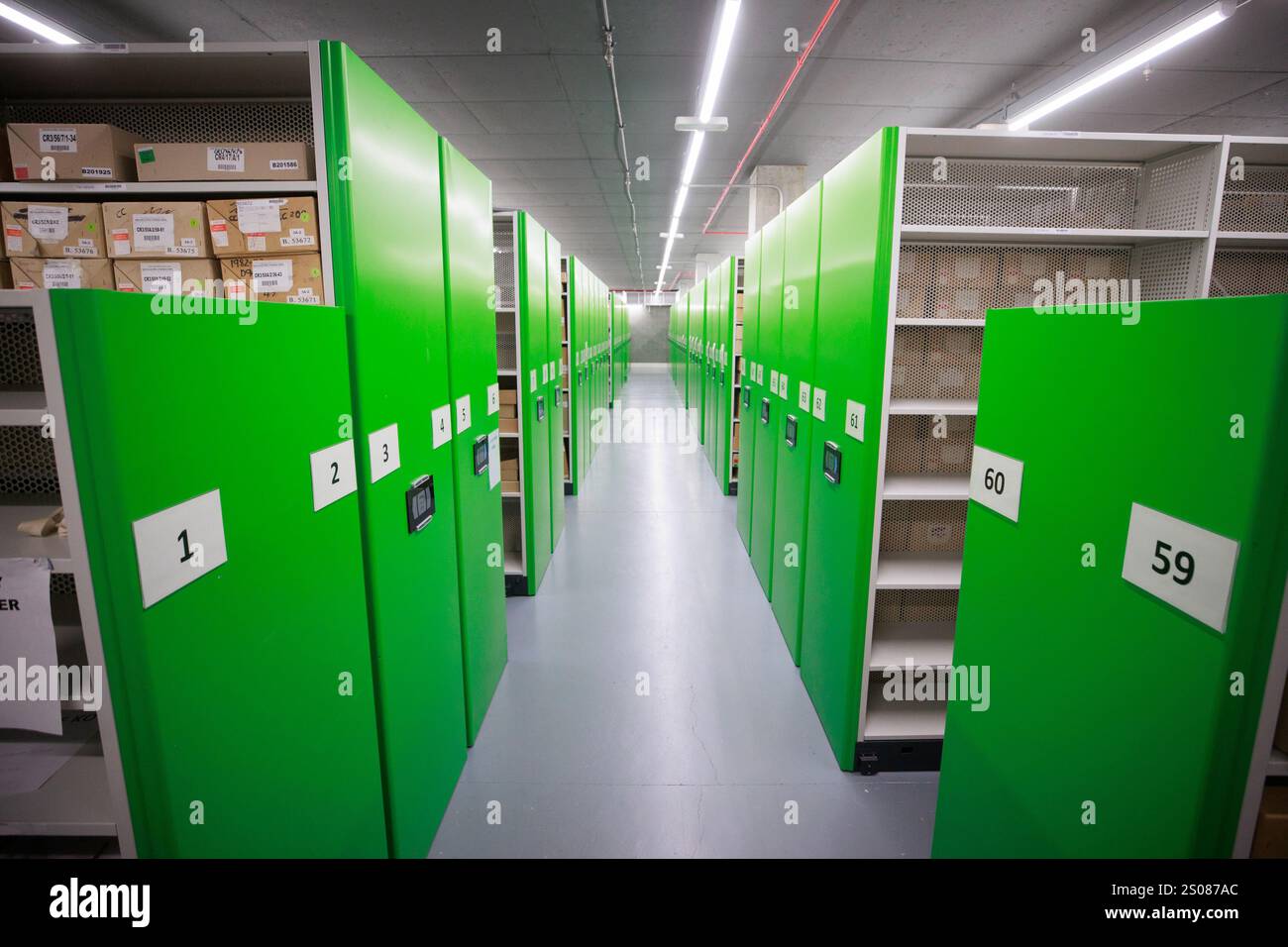 A room storing shelves of archived records at the Public Records Office ...