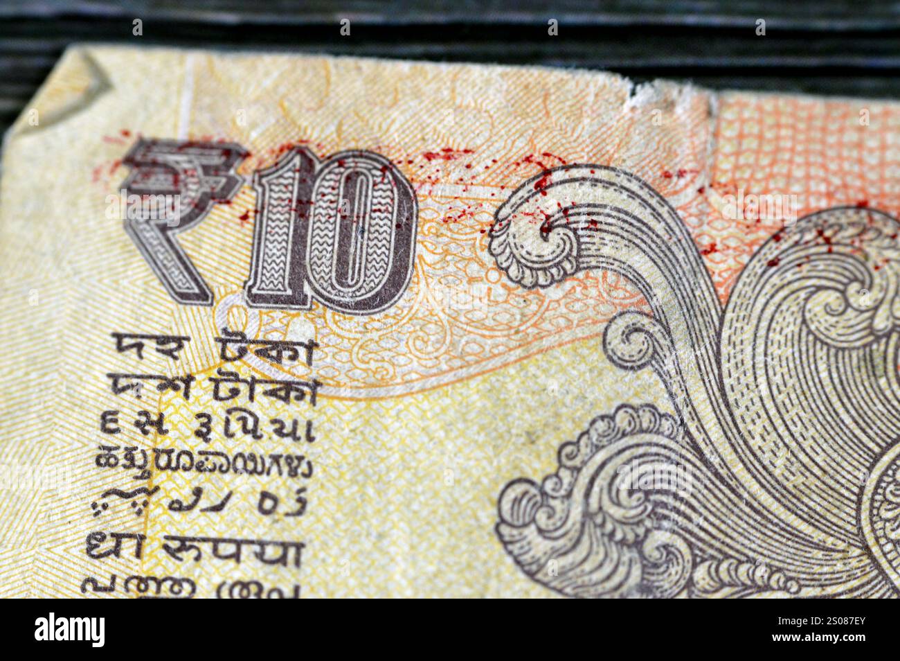 closeup of the reverse side of ten 10 Indian Rupees INR issued by ...