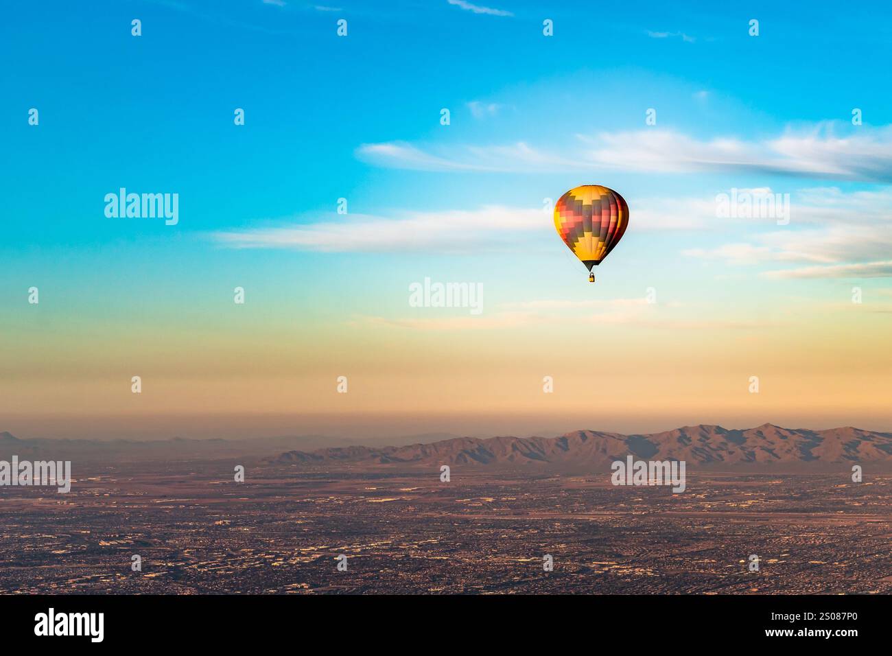 Colorful pattern hot air balloon in the skies over the Phoenix Arizona ...
