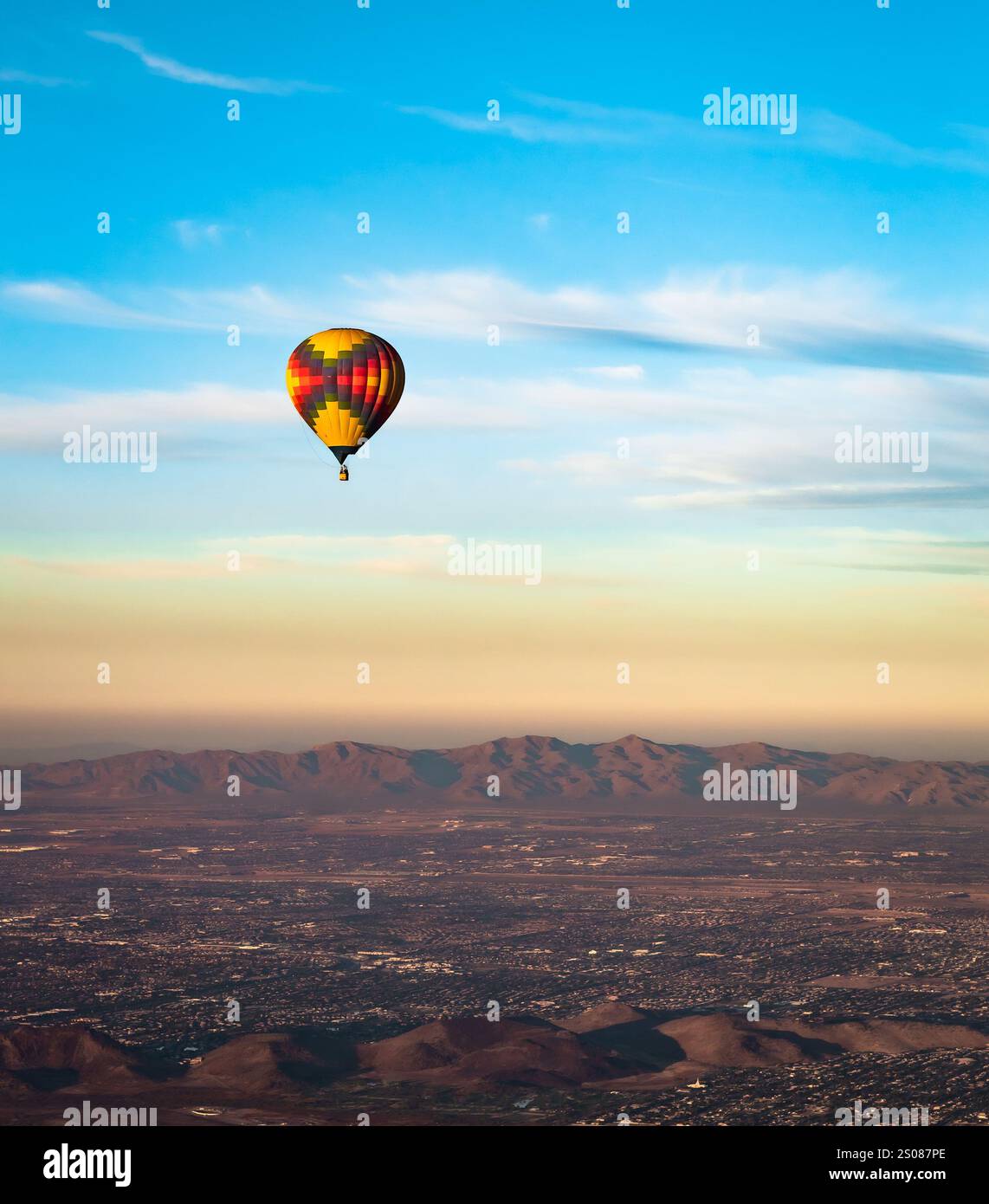 Colorful pattern hot air balloon in the skies over the Phoenix Arizona ...