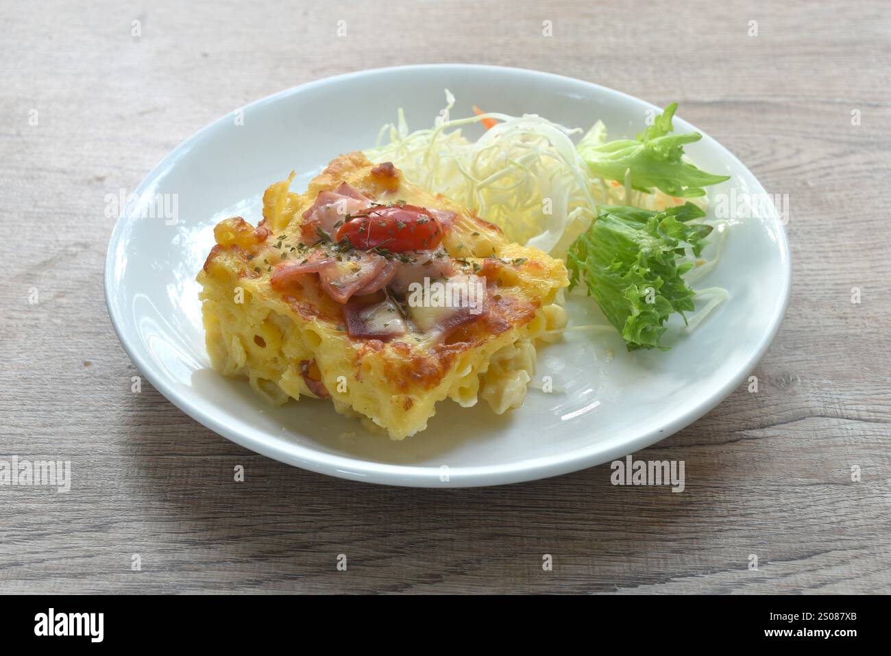 baking macaroni and slice pork bacon with chees topping tomato eat ...
