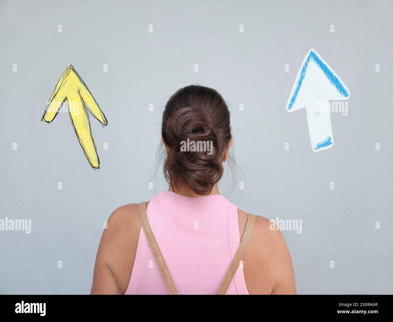 Conceptual Portrait of Woman Back with Arrows Pointing Forward Stock ...