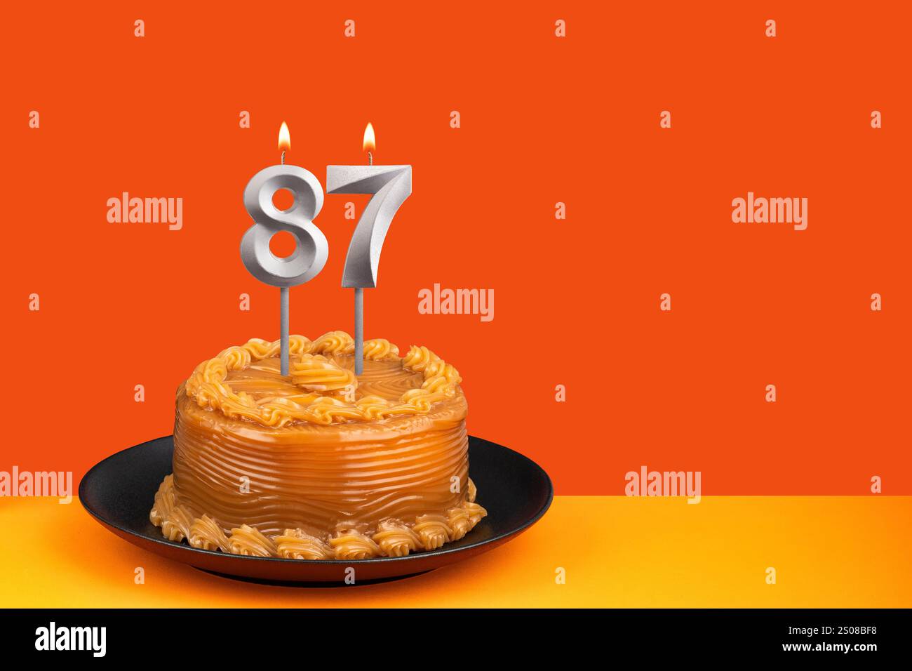 Birthday candle number 87 - Cake with dulce de leche frosting Stock ...