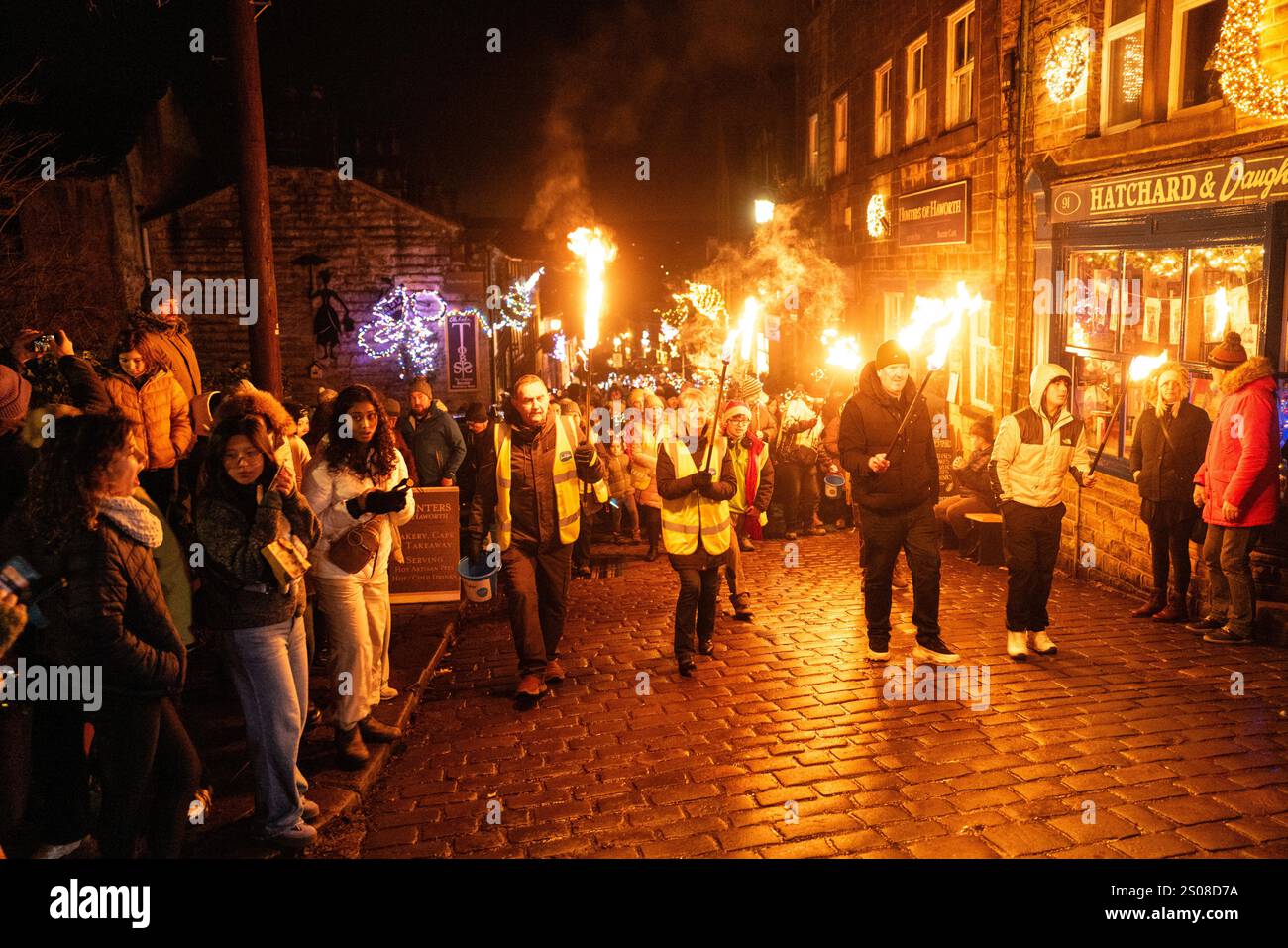 Haworth, West Yorkshire, UK: A torchligh procession is held in December each year. Flsming ...