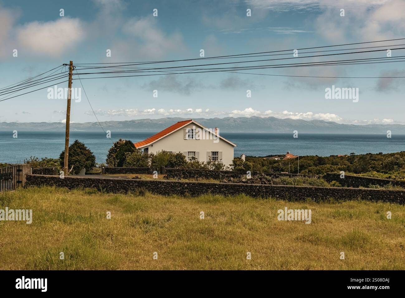 Traditional tile roof houses at Pico island Azores Portugal Stock Photo ...
