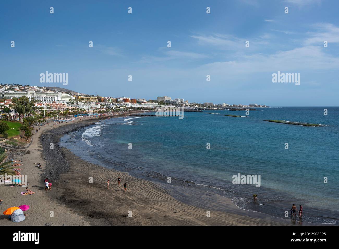 View of Playa de Fanabe, a volcanic sand beach, in Tenerife, Spain ...