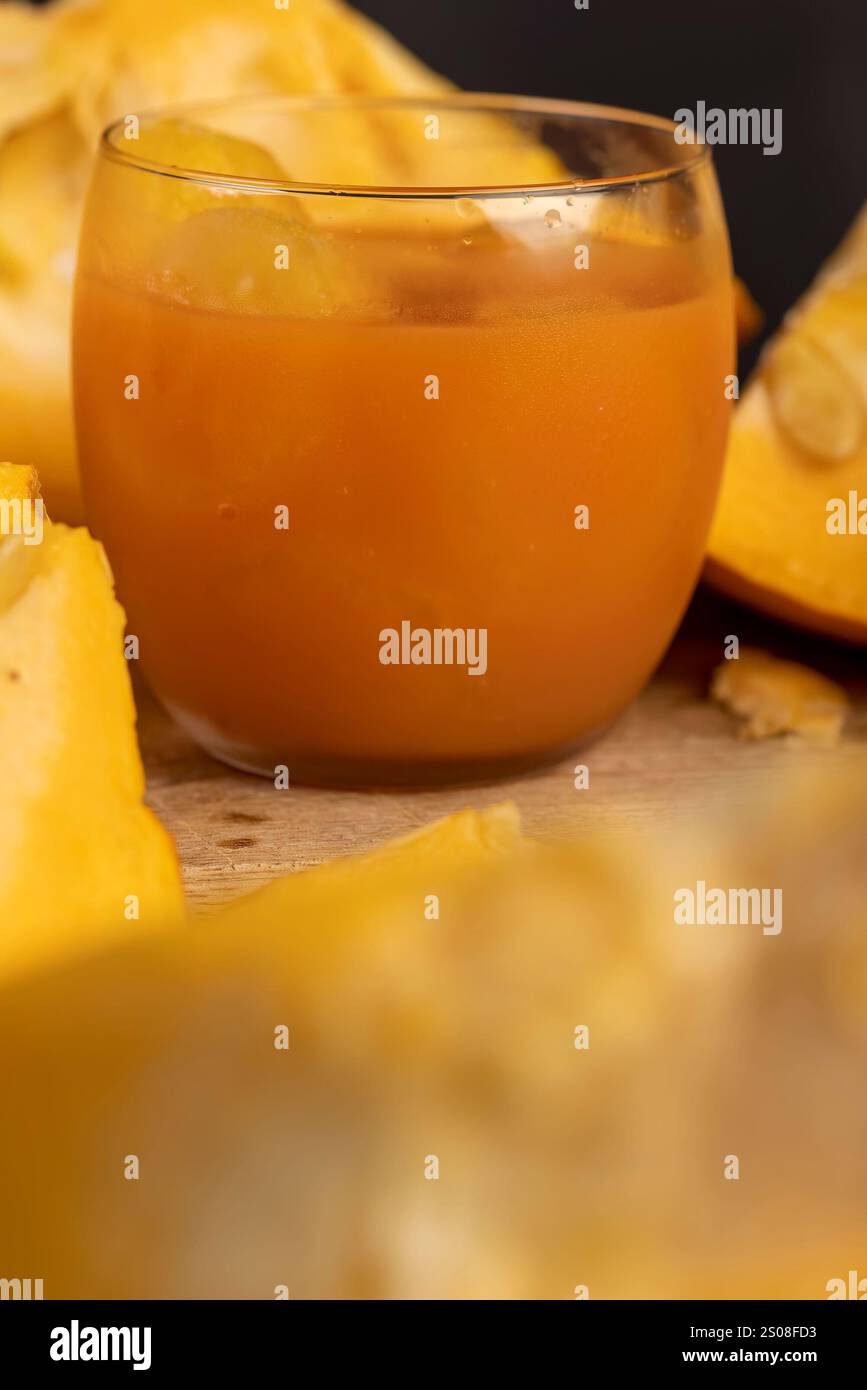 orange pumpkin with seeds and pumpkin juice cut into pieces , details ...
