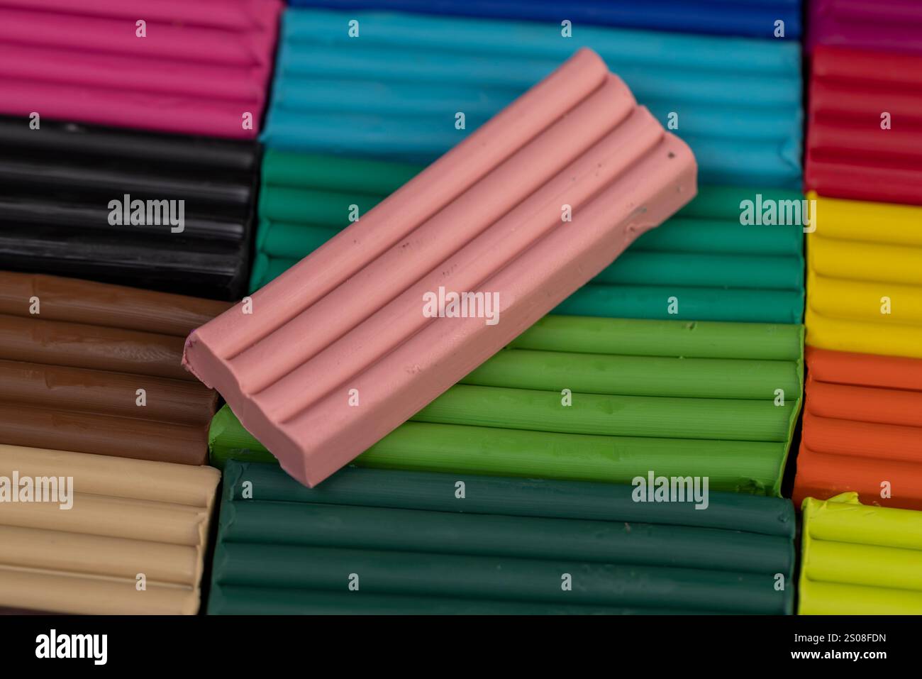 plasticine of different colors for modeling, a simple colored ...