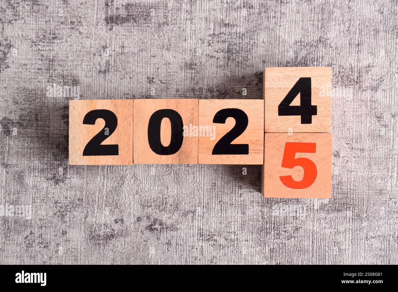 2024 year change to 2025 year on wooden cubes. Annual concept 2024,2025 ...