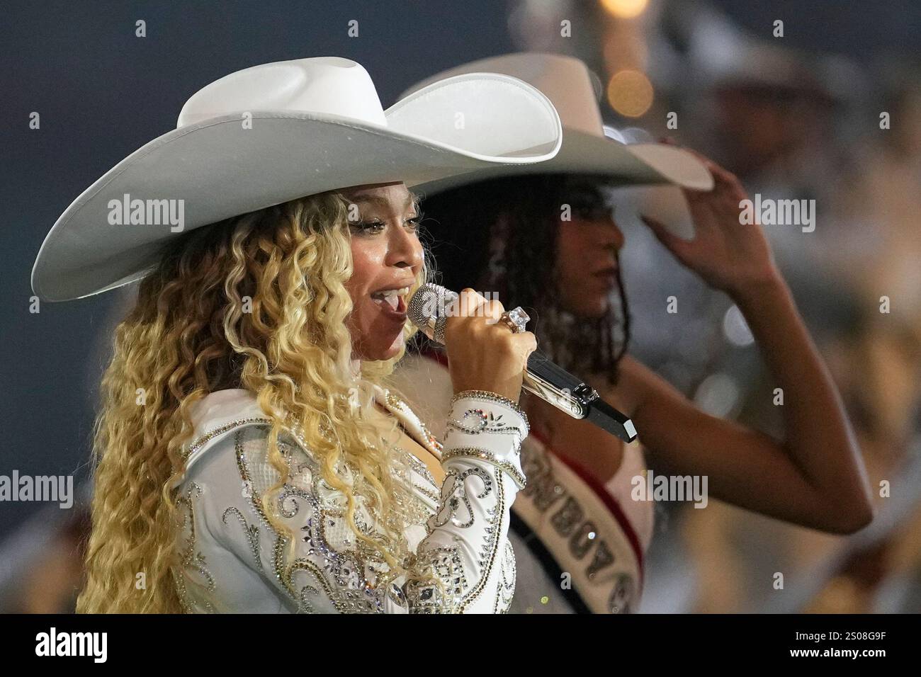 Beyoncé, left, performs with her daughter, Blue Ivy Carter, during ...