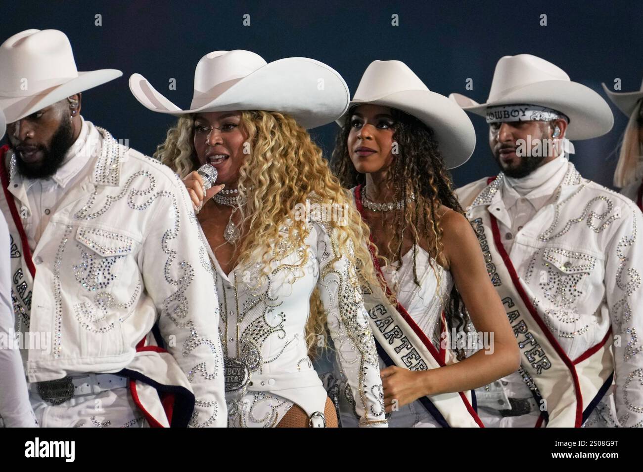 Beyoncé, center left, and her daughter, Blue Ivy Carter, perform during ...