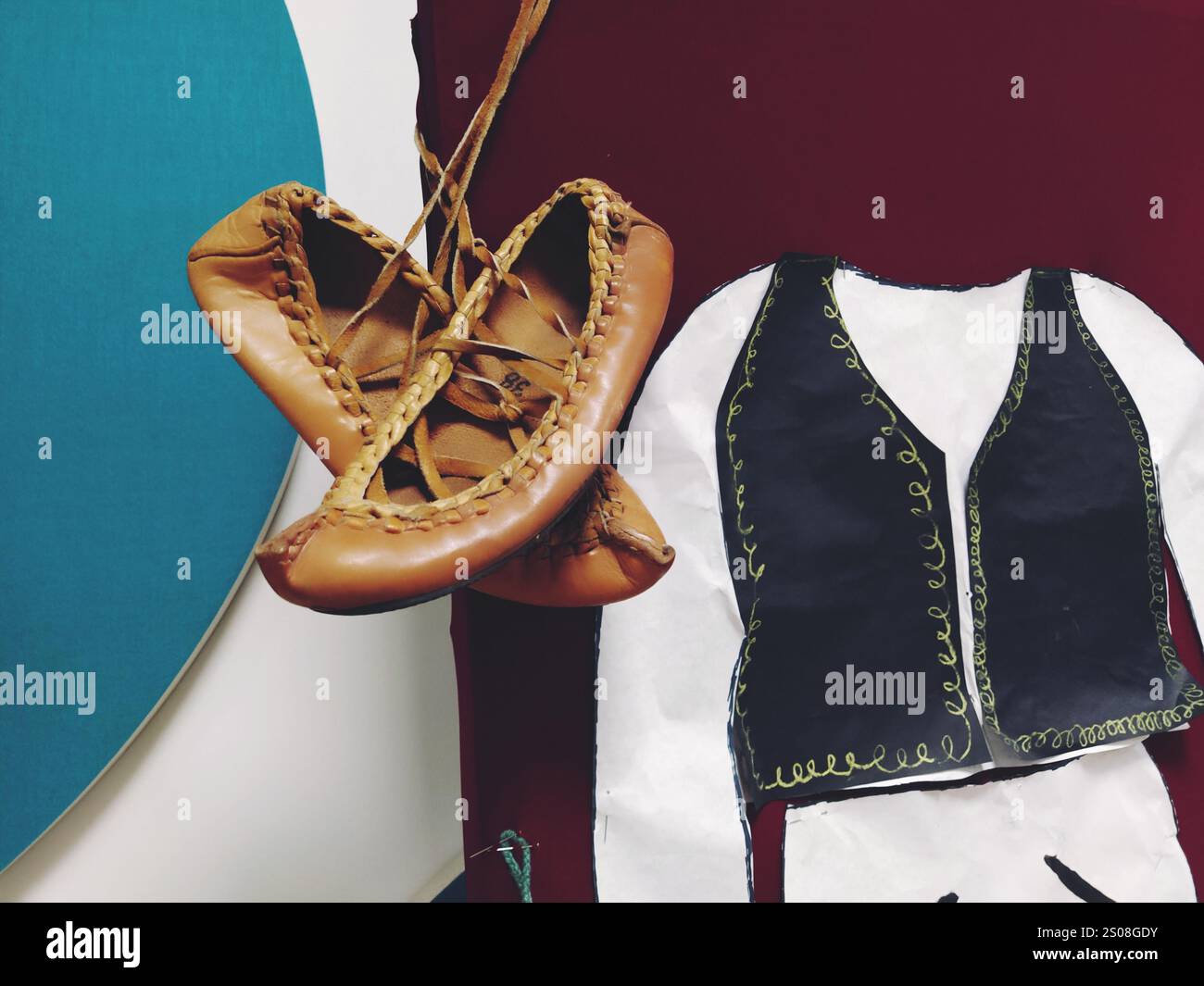 Display features traditional Serbian lapti, handmade leather shoes ...